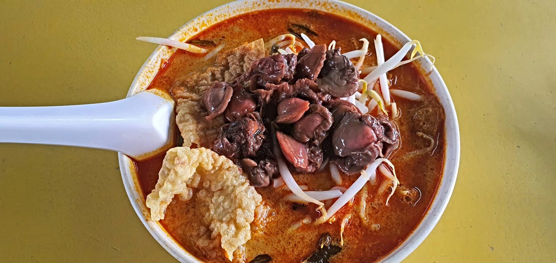 Batu 9 Curry Mee: Cockle-topped curry mee in spicy broth hidden in ...