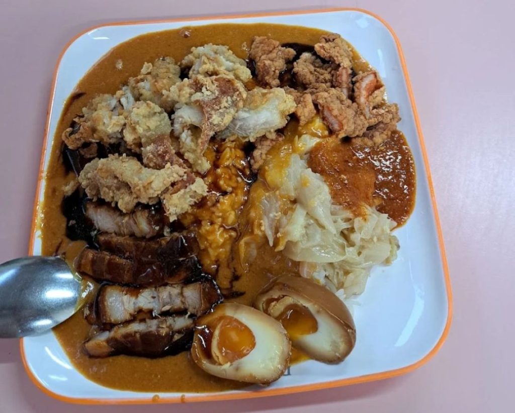 Young ex-Jumbo Seafood chef opens curry rice stall in Golden Mile Food ...